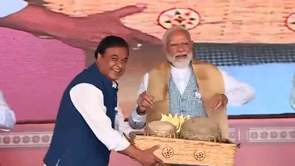 PM Modi tries his hands on traditional Assamese instrument during poll campaign in Nalbari